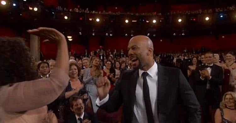 Oprah high five snubbed by rapper Common.