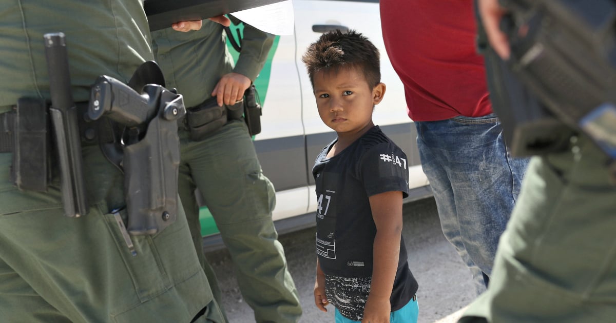 Children separated from parents at US border and detained.